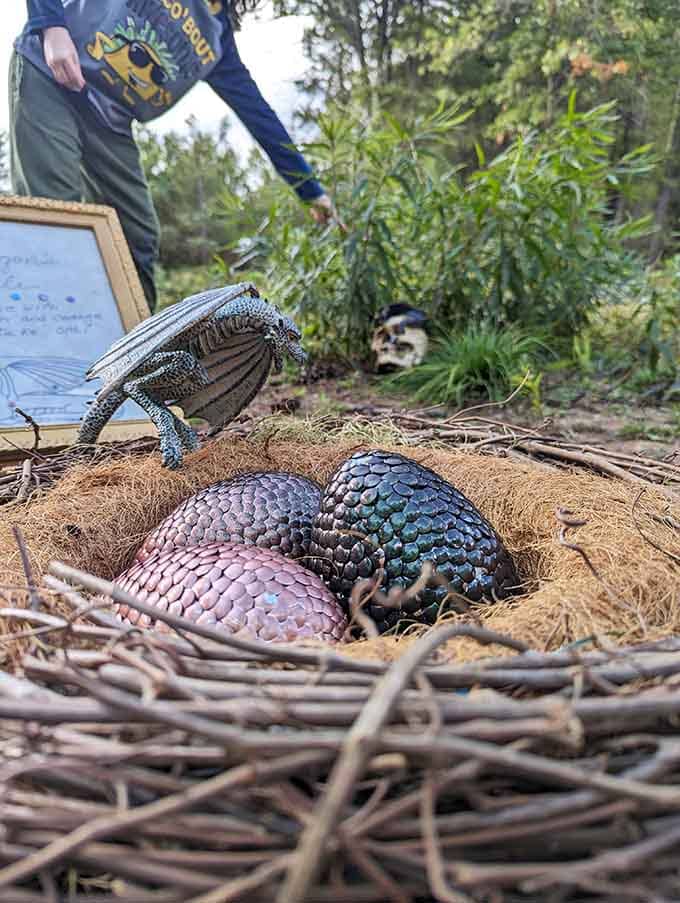 Iridescent dragon eggs nestle in their carefully crafted nest, adding a touch of fantasy magic to the grounds.