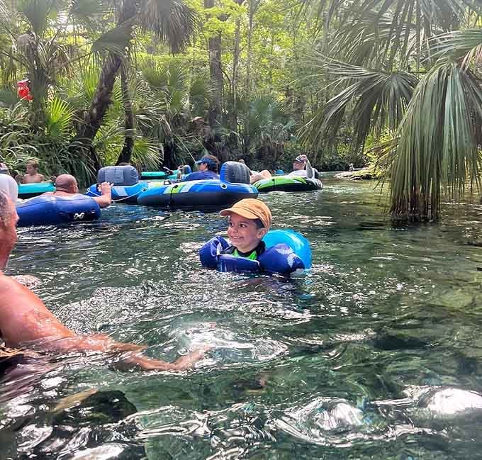 Tubing down Rock Springs Run with fellow floaters, all sharing that same blissed-out expression of pure contentment.