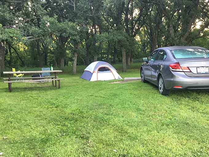 Your campsite awaits with picnic table, fire ring, and enough space to truly unwind under the stars.