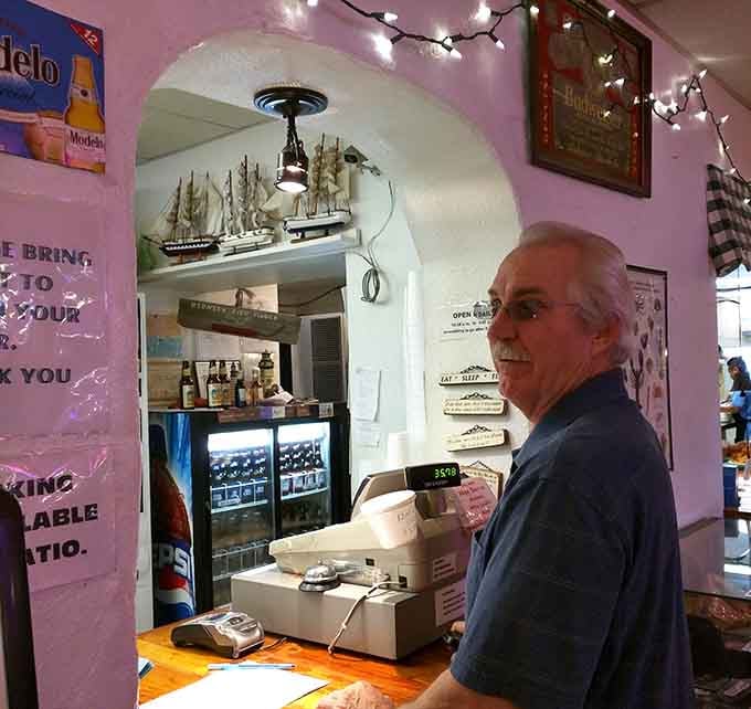 The order counter where friendly faces greet you and lighthouse photos remind you of distant shores.