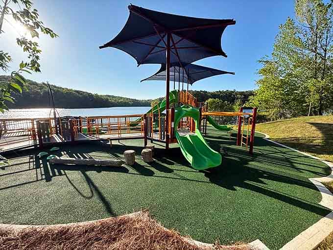 Modern playground equipment overlooking the lake keeps kids entertained while adults soak in the scenery nearby.