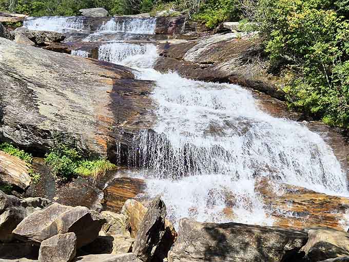 Smaller cascades creating their own miniature waterfall show, like nature's opening act before the headliner.