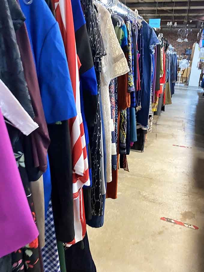 Women's clothing racks stretch endlessly, a rainbow of fabrics representing every fashion era you can imagine.