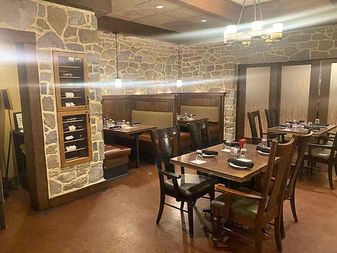 Stone walls and comfortable booths create the kind of dining space where you actually want to linger awhile.