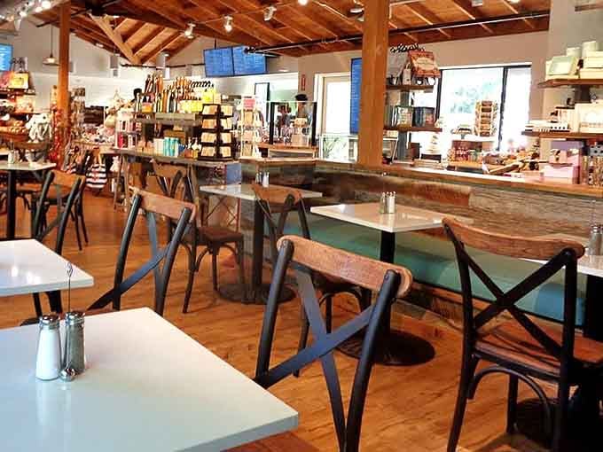 Exposed beams and warm lighting create an atmosphere where lingering over breakfast feels practically mandatory, not optional.