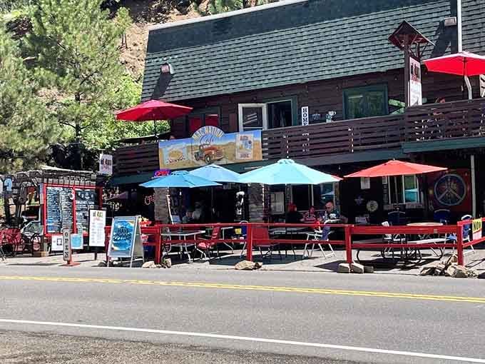 Outdoor seating with mountain views and colorful umbrellas&mdash;because mac and cheese tastes even better in fresh air.