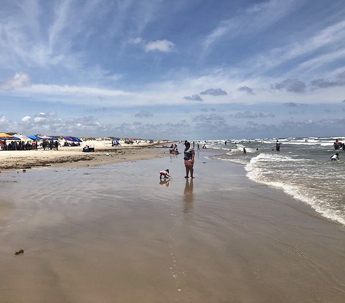 The beach welcomes everyone from solo wanderers to families, because good vibes don't require a guest list or VIP section.