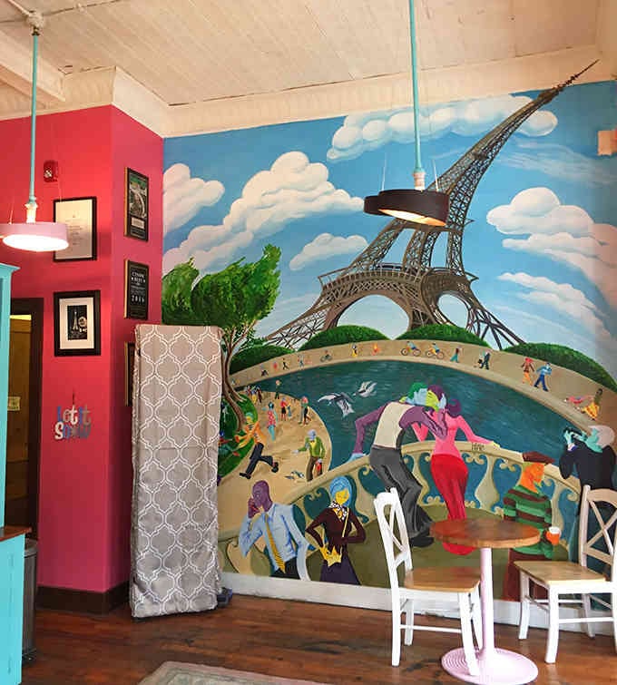 That Eiffel Tower mural transports you straight to Paris without the jet lag or passport hassle.