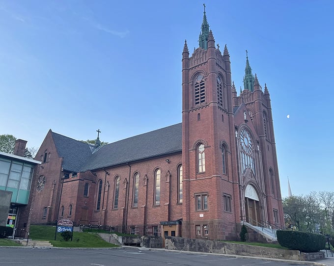 St. Rose Church's twin spires reach skyward, anchoring the neighborhood with grace that transcends any particular Sunday service schedule.