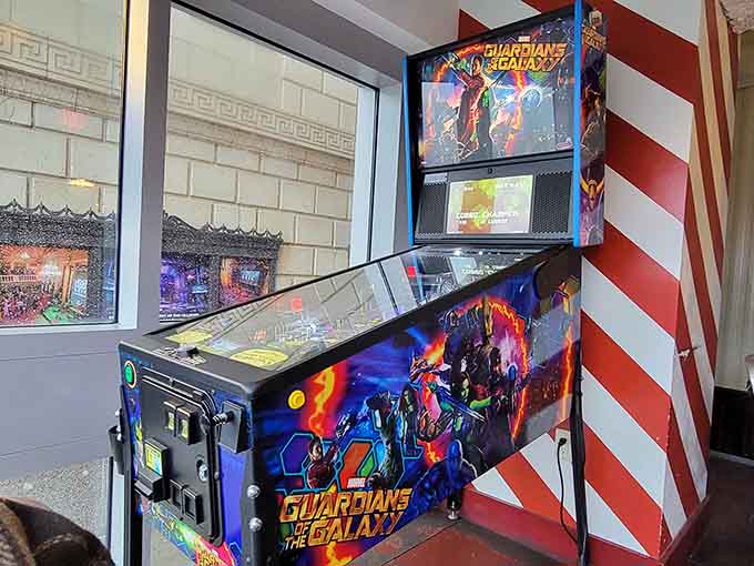 A pinball machine adds playful nostalgia to your dining experience, because why not have fun?