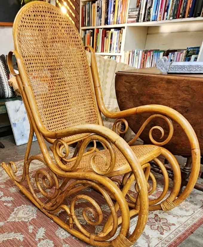 Bentwood rocking chair with scrollwork fancy enough to make your grandmother weep with nostalgic joy and envy.