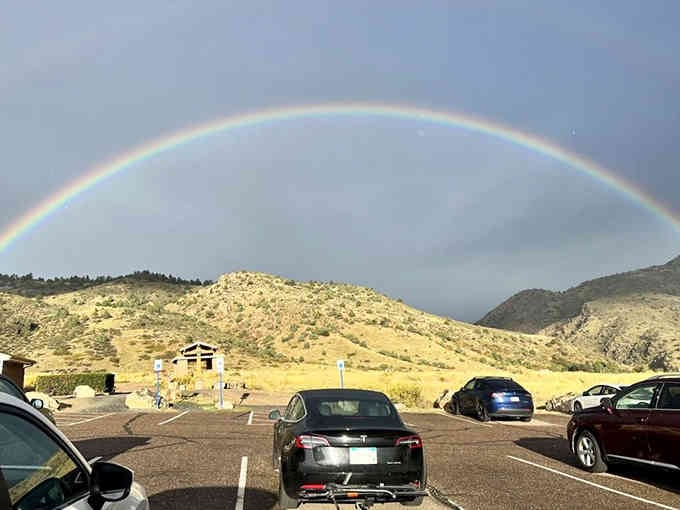 Rainbow over the parking lot feels like nature's way of saying you picked the perfect day to visit.