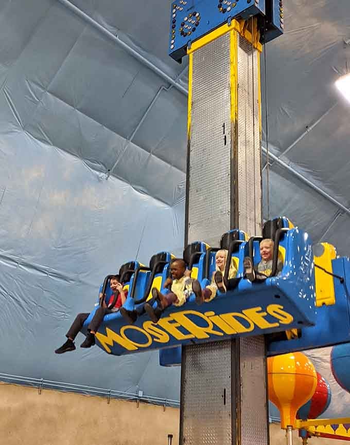 That drop tower launches riders skyward with grins plastered across their faces, defying indoor gravity spectacularly.