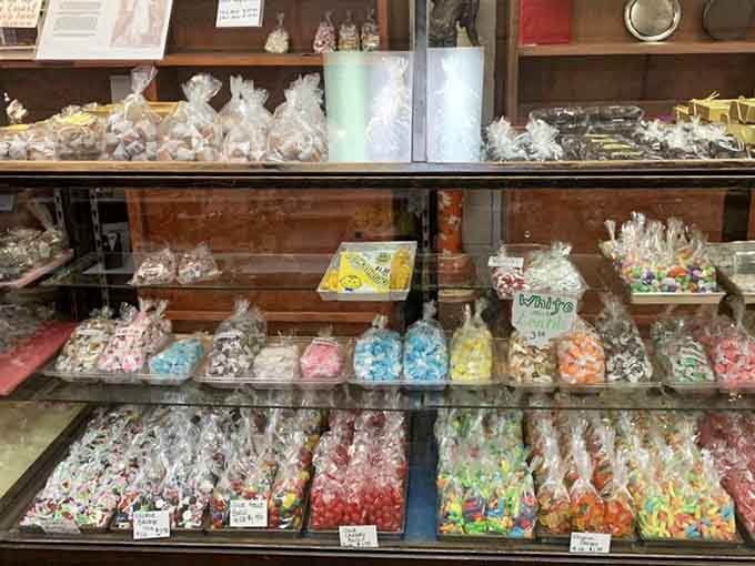 Rows of colorful confections arranged like edible artwork, each bag a small masterpiece waiting to make someone's day infinitely sweeter and brighter.