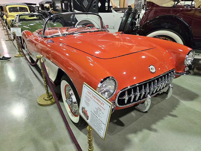 The '57 Corvette in that gorgeous coral color makes modern sports cars look like they're not even trying anymore.