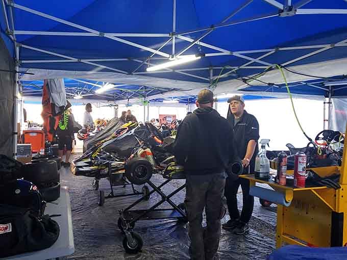 The pit area buzzes with technical discussions that sound like a foreign language to newcomers.