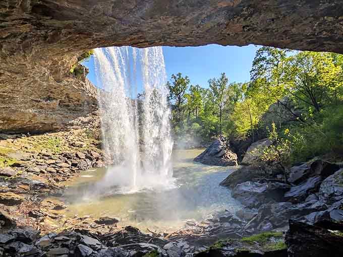 Standing behind the waterfall feels like being in nature's VIP section, where the view is worth getting wet.