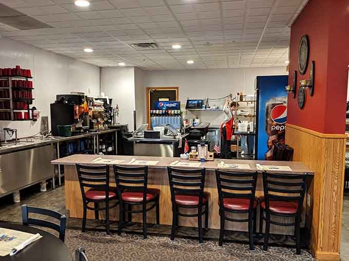 Counter seating where you can watch the magic happen while contemplating your pie selection strategy.