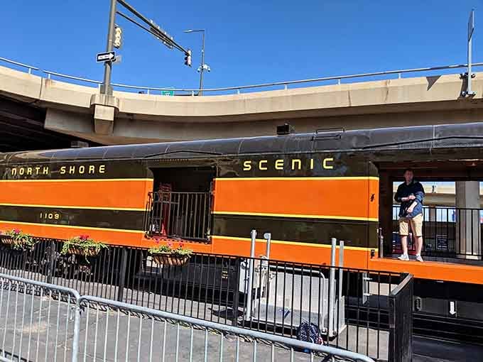 The North Shore Scenic branding on that orange stripe announces this isn't your average boring commuter rail experience.