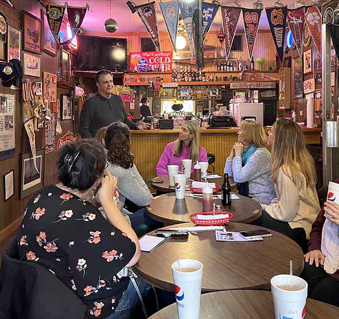 Groups gathering around tables, sharing stories and sodas, exactly how community spaces are supposed to function daily.