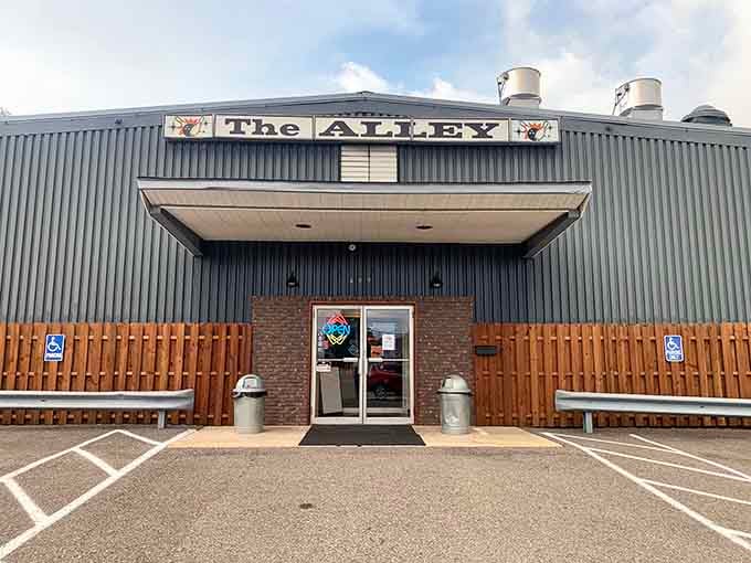 The Alley's industrial exterior hides whatever fun happens inside, like a surprise party that never quite ends for the locals.
