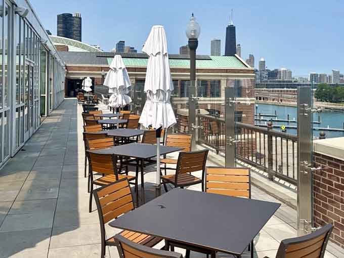 Wooden tables on the outdoor deck offer front-row seats to Lake Michigan's daily performance&mdash;no ticket required here.
