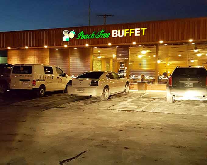 The glowing exterior at night welcomes hungry travelers like a beacon of hope in a sea of mediocrity.