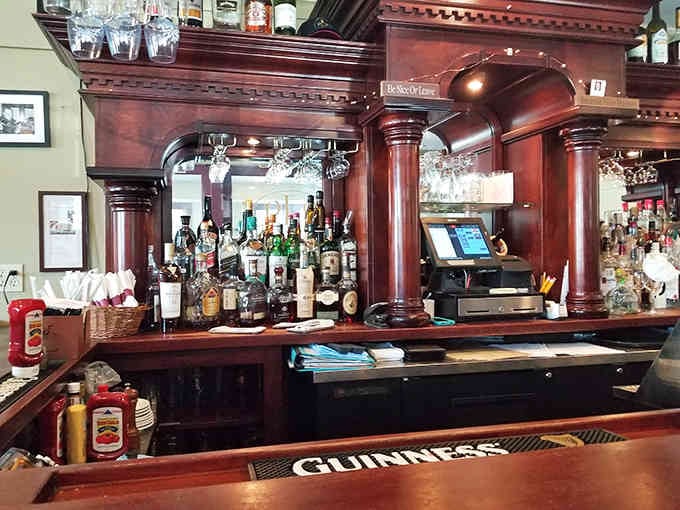 That gorgeous wooden bar with Guinness mat ready speaks the international language of "pull up a stool, friend."