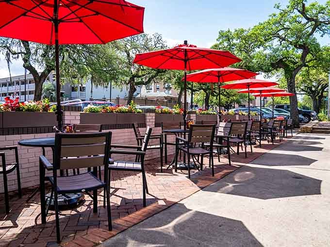 Red umbrellas line the patio like soldiers standing guard, ready to shade diners from the Georgia sunshine.