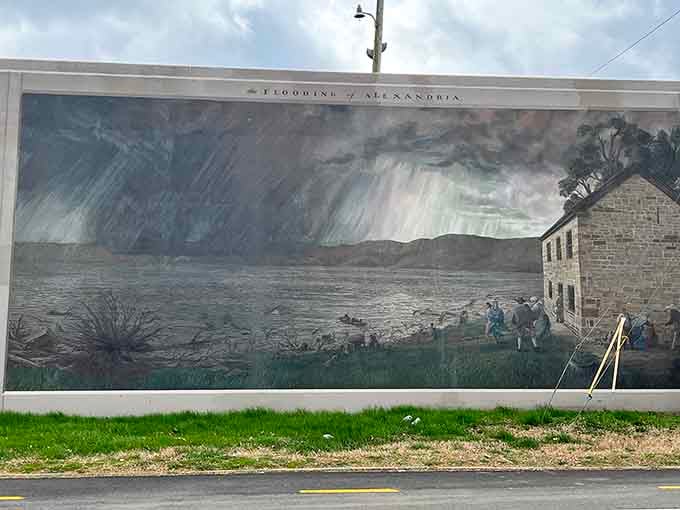 Floodwaters rise in this haunting scene, a stark reminder of why this massive wall exists in the first place.