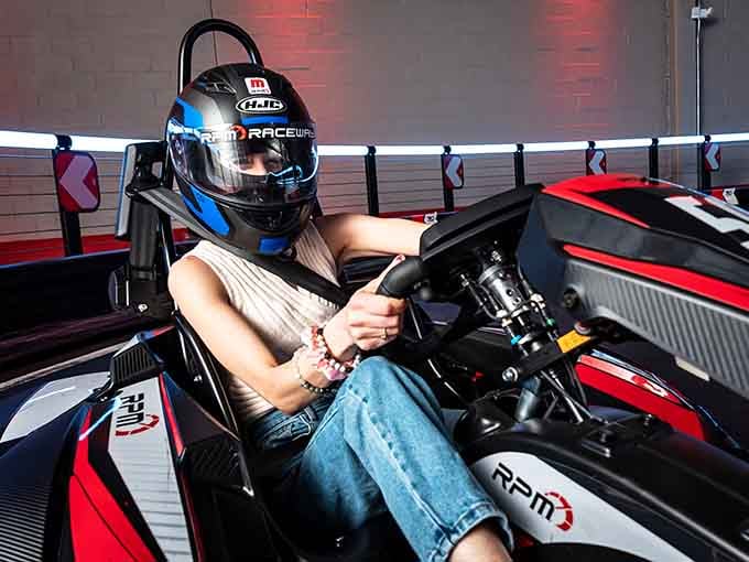 The sleek karts and professional setup make it clear this isn't your childhood carnival ride, this is the real deal indoors.