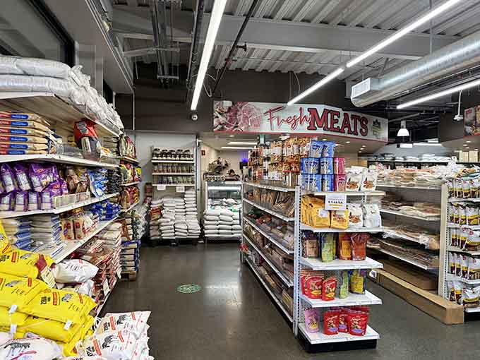 The meat counter beckons in the distance while dried goods stand guard, creating a delicious crossroads of choices.