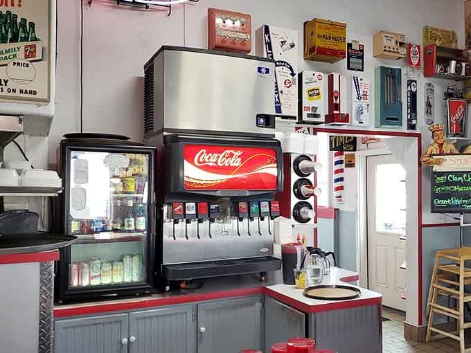 Even the beverage station gets the vintage treatment, with Coca-Cola branding and retro touches throughout the space.