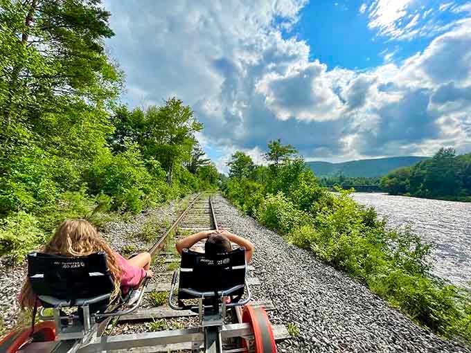 River on one side, mountains ahead, and clouds that look painted on, this is what postcards wish they could capture.