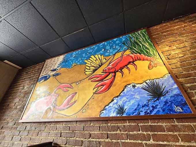 This whimsical lobster mural adds personality and color, reminding diners they're here for ocean treasures despite the zip code.