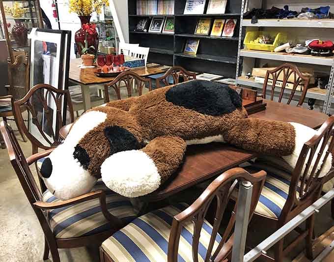 A giant plush dog sprawled across the dining table proves that whimsy has no age limit in home d&eacute;cor.
