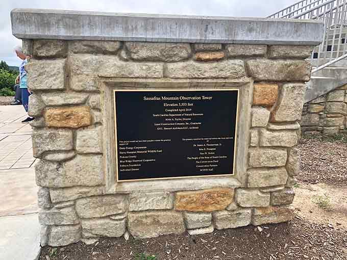 The dedication plaque tells the tower's story&mdash;completed in 2019, making this a relatively new way to touch the sky.