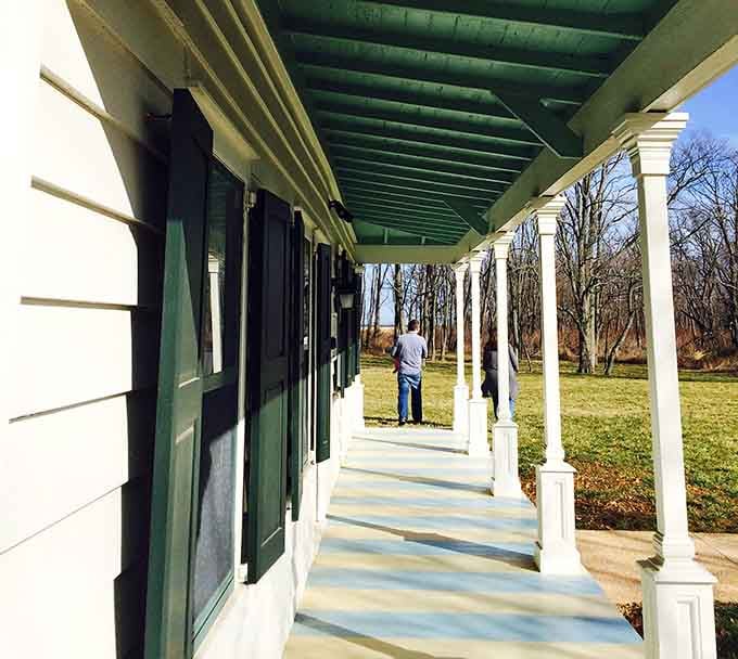 That wraparound porch has seen soldiers, travelers, and tavern patrons for centuries, and apparently some never left.