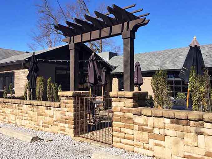 A welcoming entrance to a tavern where neighborhood charm meets surprisingly sophisticated seafood done with genuine care and skill.
