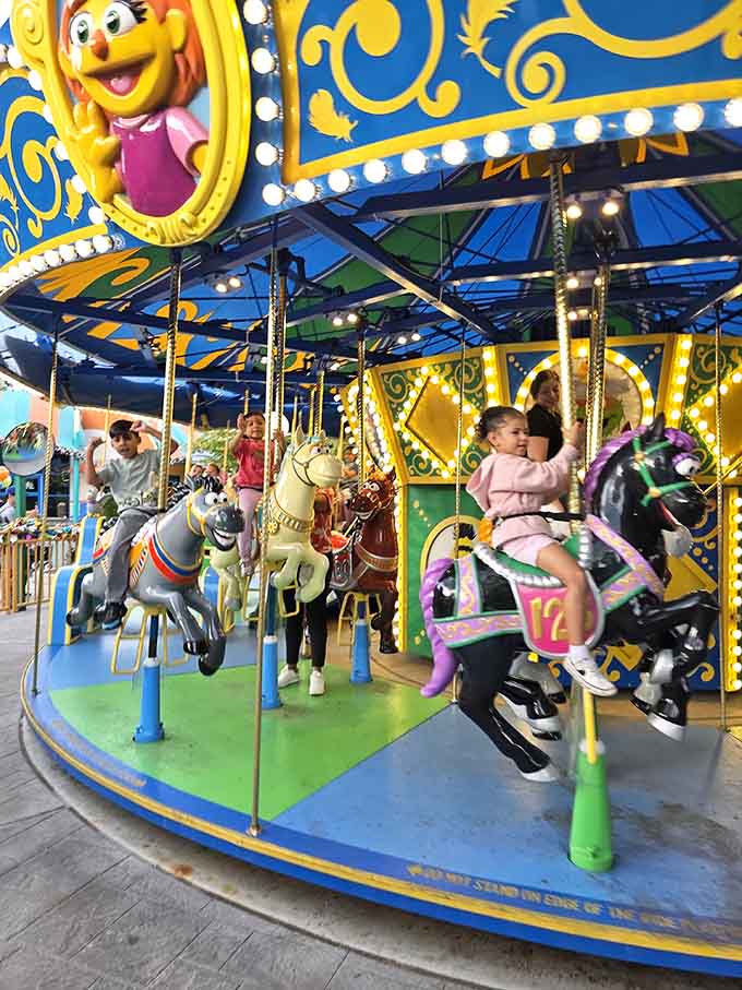 This carousel spins childhood dreams into reality, one painted horse at a time, round and round.