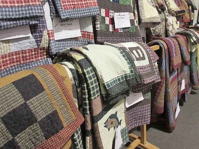 Handmade quilts displaying patterns and craftsmanship that put your store-bought comforter to absolute shame.