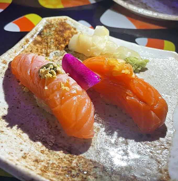 Nigiri lined up like edible art, each piece a small testament to precision and really fresh fish.