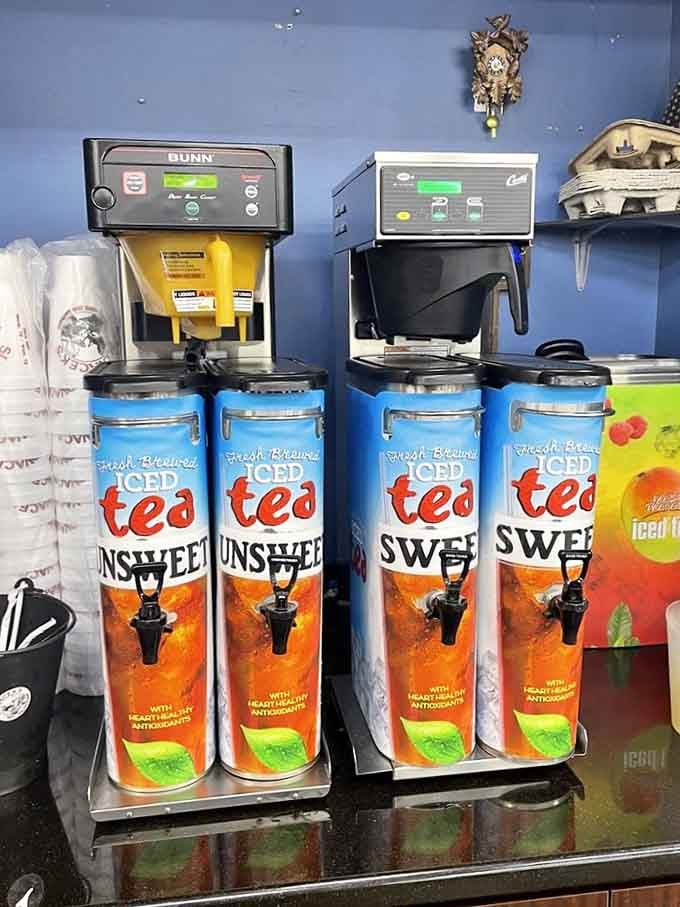 Fresh-brewed iced tea dispensers stand ready to quench your thirst after consuming multiple kolaches in rapid succession.