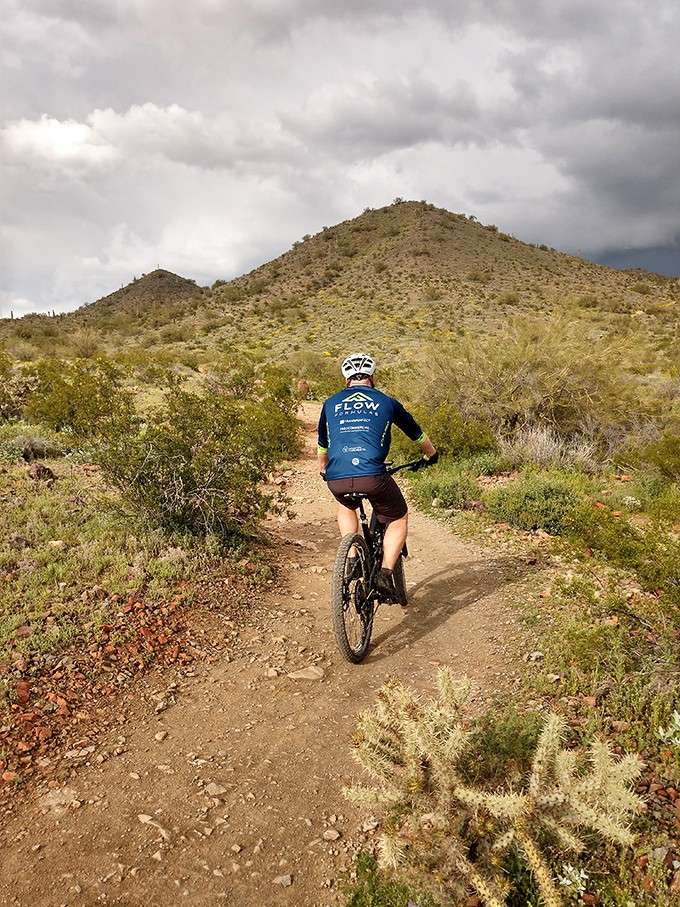 Mountain bikers find their happy place on trails that wind through scenery so stunning it almost distracts from the workout.