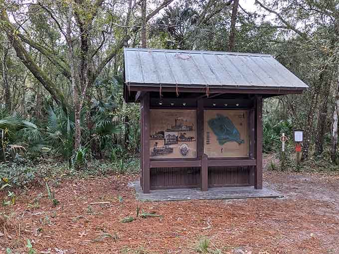 Information kiosks share the town's history, offering context for the ruins you're about to discover ahead.