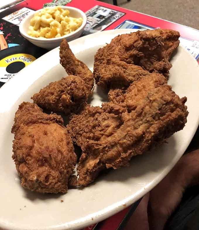 Fried chicken with that shatteringly crisp crust and juicy interior, the kind that makes you understand why people write love songs.