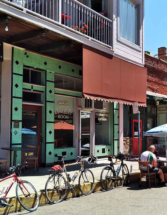 Colorful storefronts line the street like a box of crayons that decided to become architecture instead.