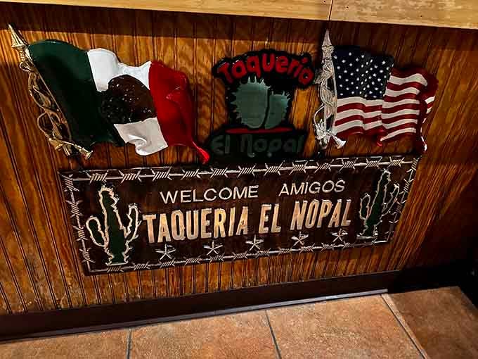 Welcome sign displaying both flags, reminding everyone that great food builds bridges between cultures and hungry people.