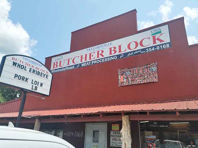 Bold red signage announces where serious meat lovers come for quality cuts and old-fashioned butcher shop service.