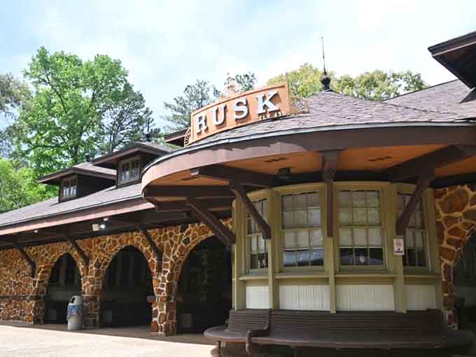 The historic Rusk depot building stands proud, its unique stonework architecture worthy of its own postcard.